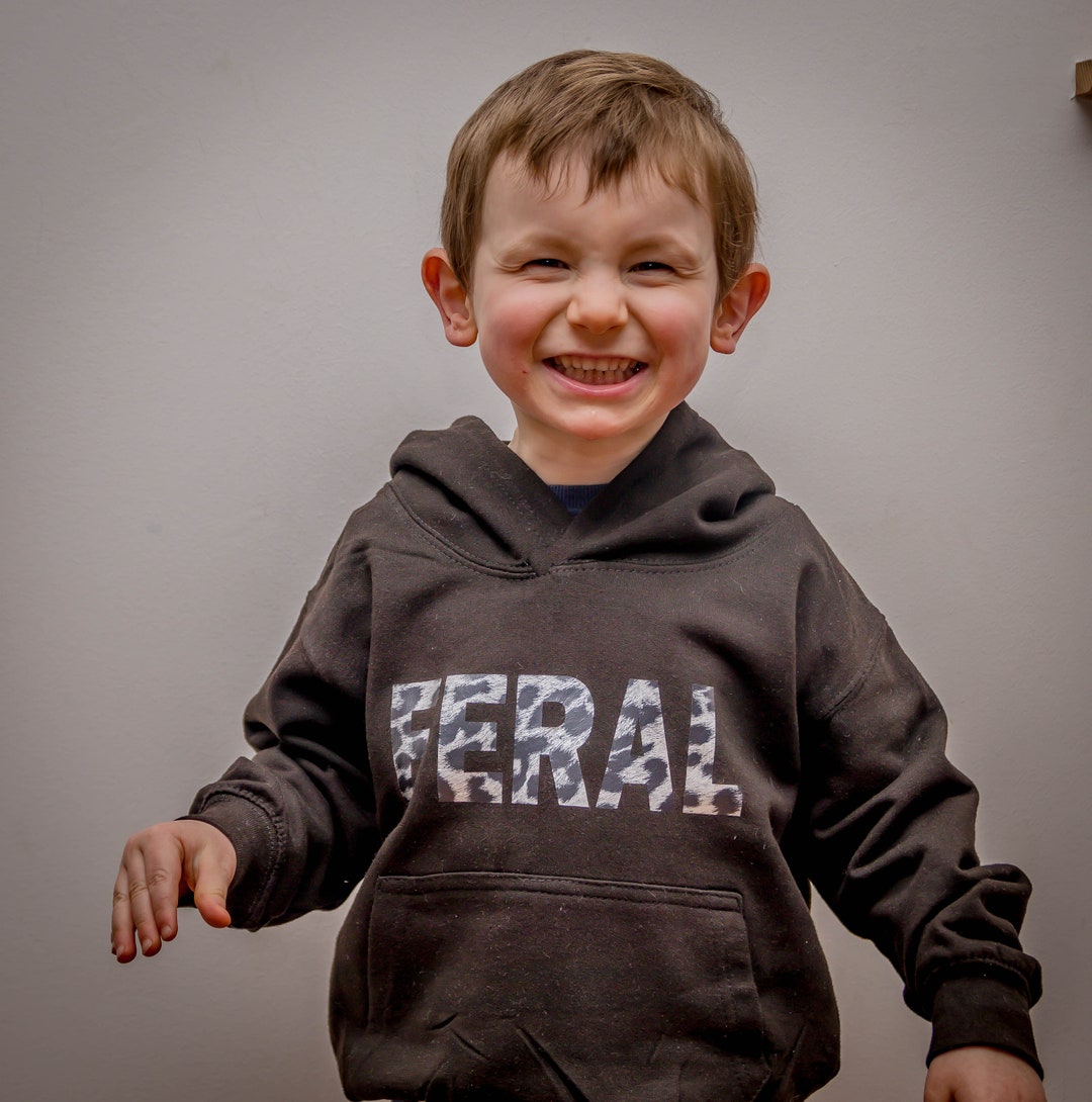 Childs Black hoody with feral child animal print design. Perfect for ...