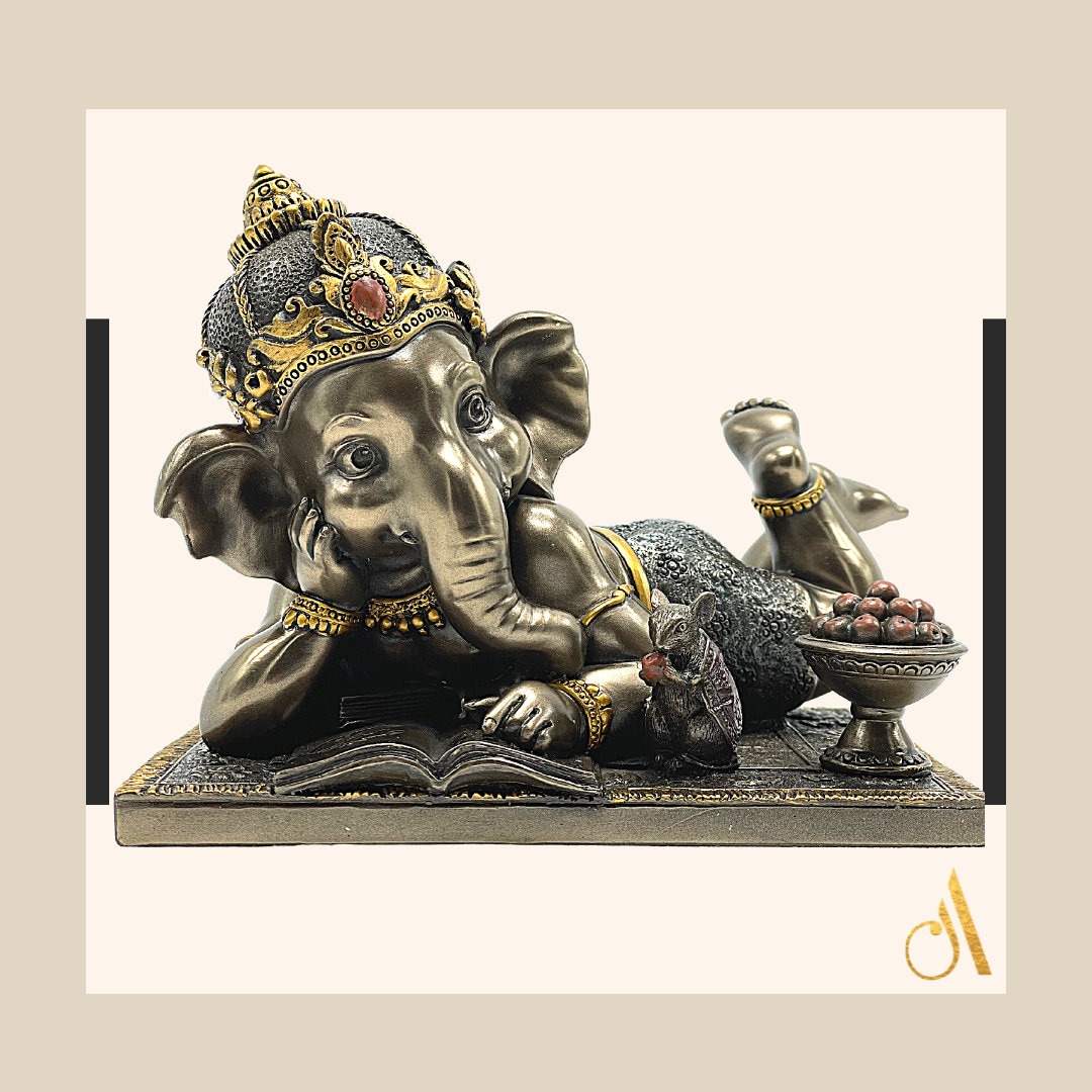 Baby Ganesha With Modak (sweets) and Reading Book | Ganpati - God of ...