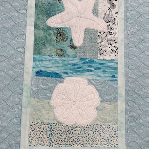 Seashells in Ocean Art Quilt Wall Hanging. Quilting Resembles Movement ...