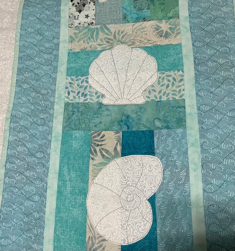 Seashells in Ocean Art Quilt Wall Hanging. Quilting Resembles Movement ...