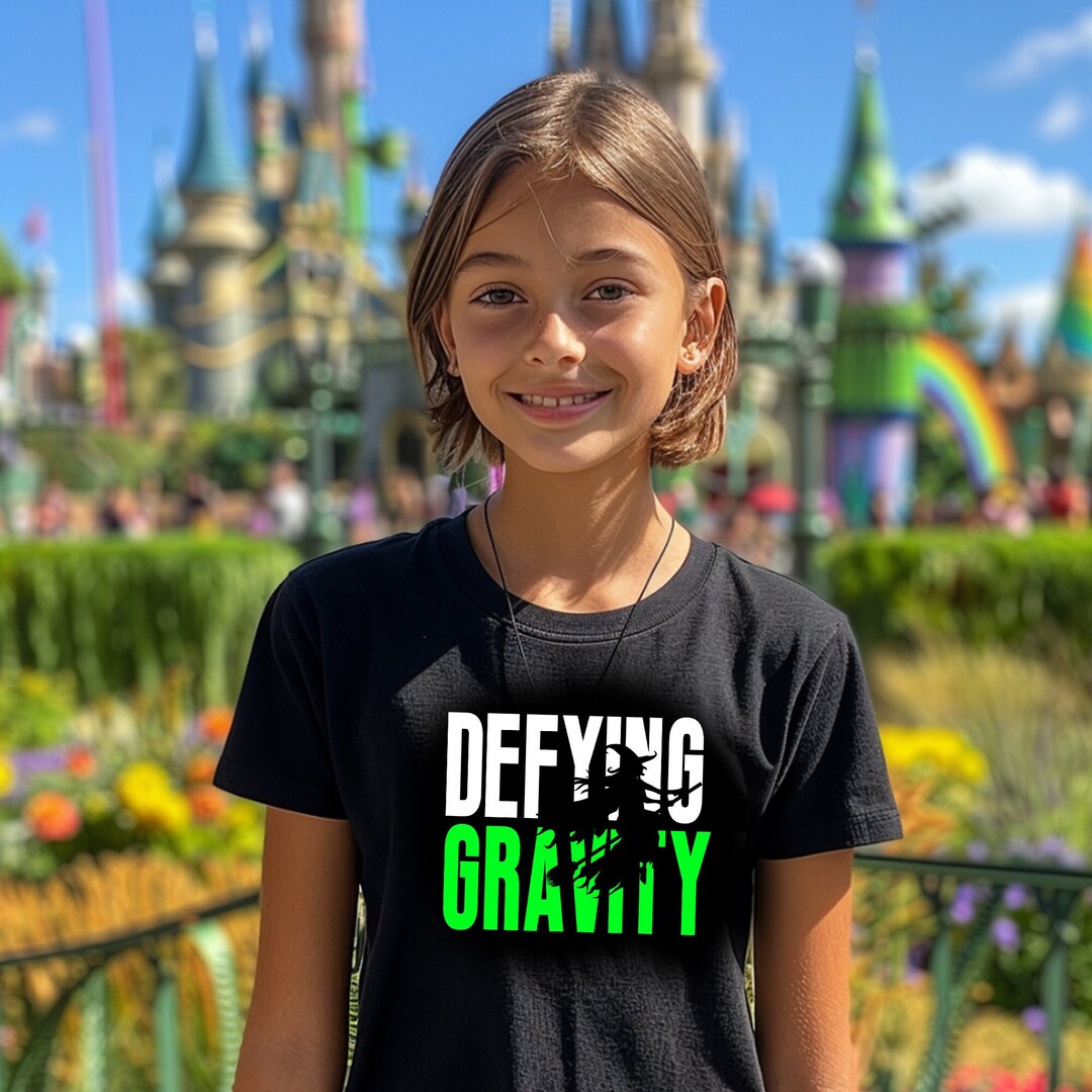 Defying Gravity Broadway Musical Youth Apparel - A New Musical Shirt, Untold Story of the ...