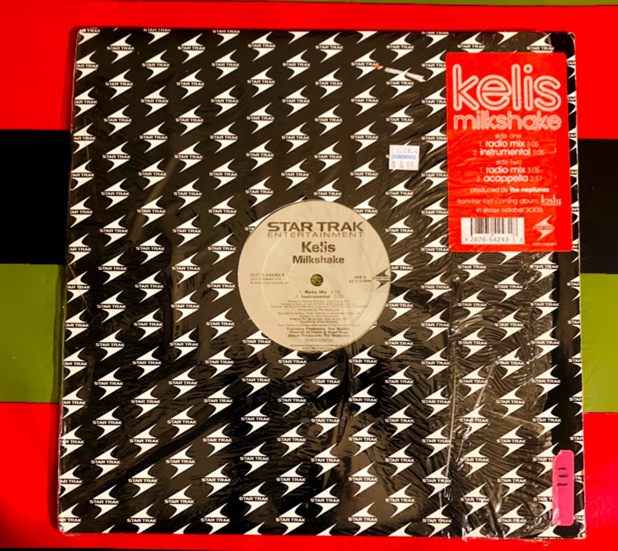 Kelis Milkshake Album Cover