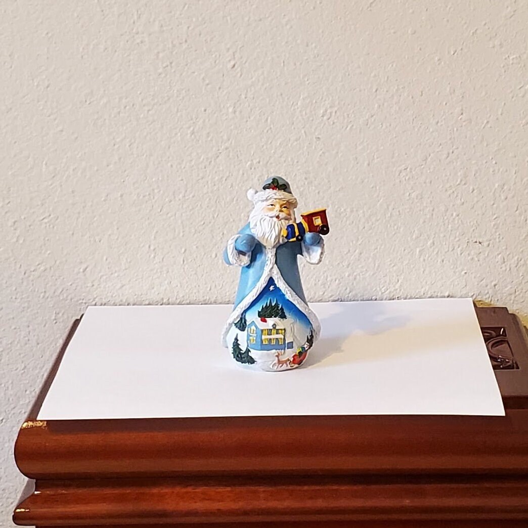 Santa in Blue Delivering Toys Figurine Previously Owned - Etsy