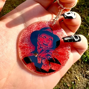 Horror Character Themed Keychains, Horror Character and Blood Splatter ...