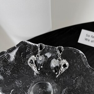 Gradient Black Heart Earrings With Metallic Finish Liquid Metal Black ...