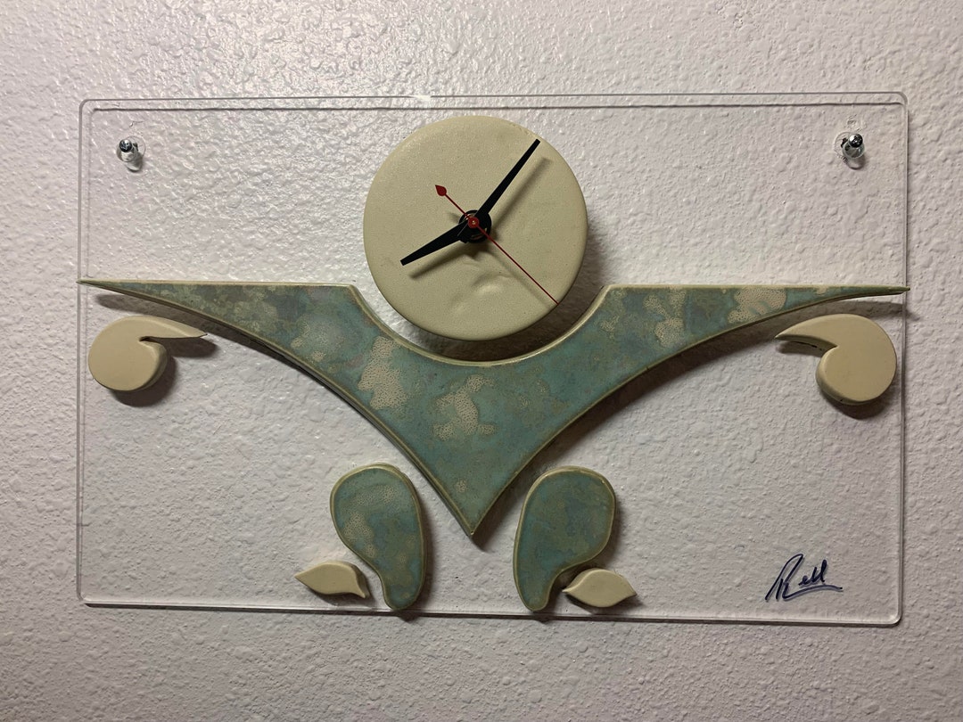 Impressive Art Decor as a Detailed Clock. A Striking Wall Clock. It's a ...