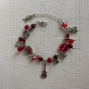 Handmade Cluttered Spider and Guitar Matching Friendship Bracelets ...