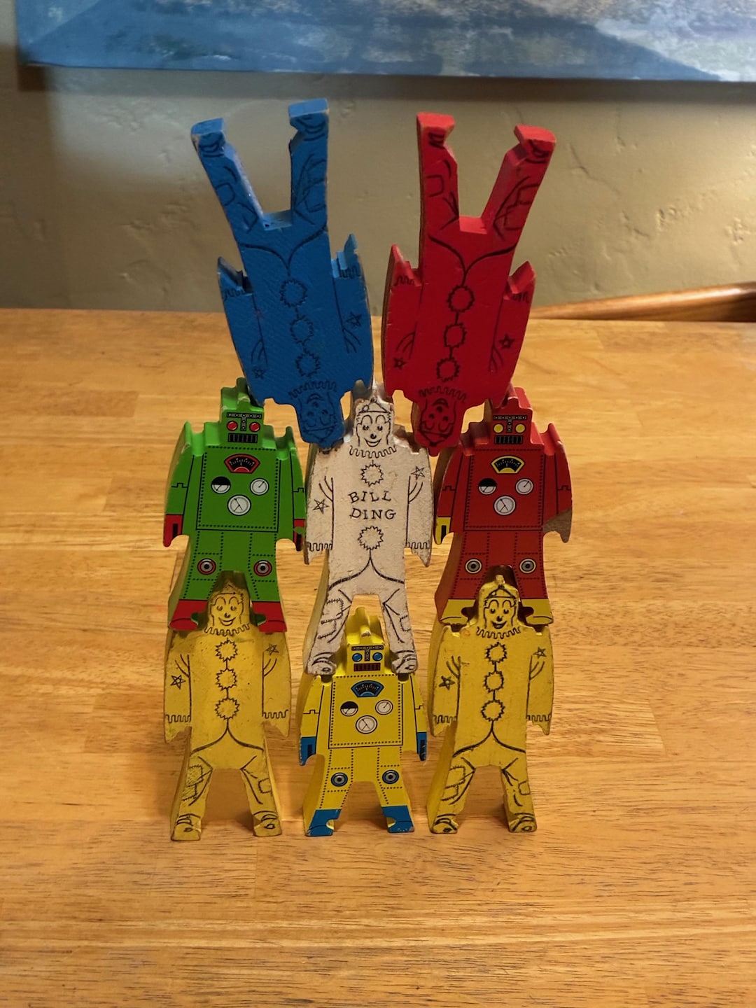 Three Schylling Stacking Wooden Robots and Five 1940's Bill Ding ...
