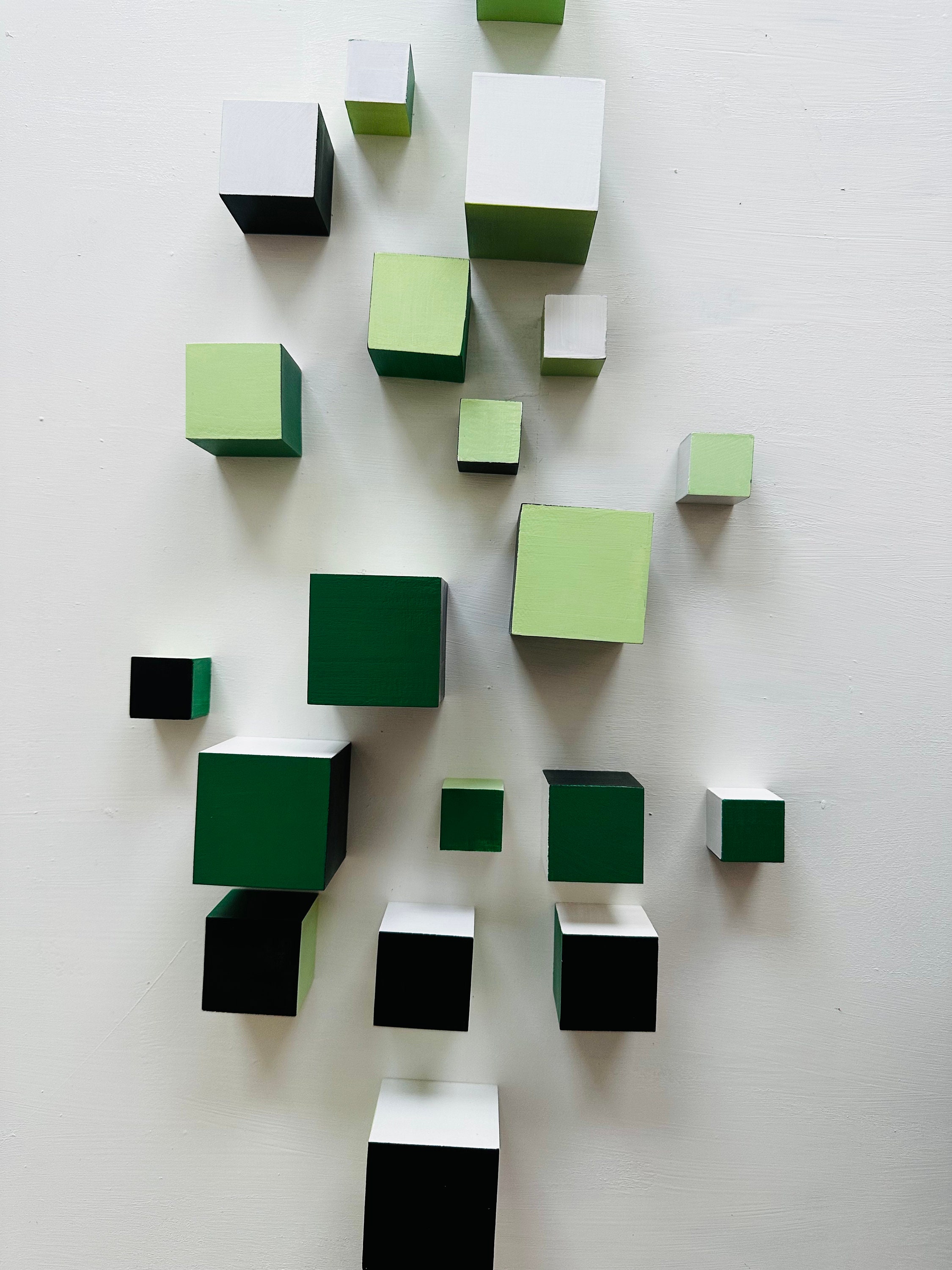 Packs of 20 Captivating 3D Wooden Wall Cubes in a Kaleidoscope of ...