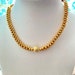 Traditional Marathi Thusi Choker Style Necklace in Gold Finish ...