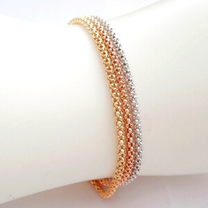 18k Gold Triptych Bracelet Composed of Three Tubular Bracelets of ...