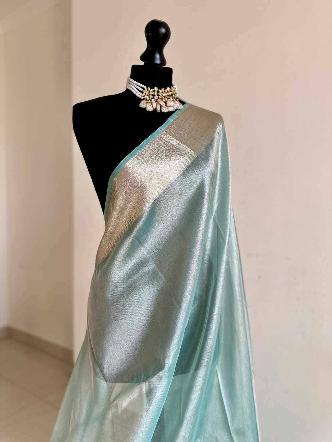 Pale Blue Shimmer Soft Tissue Saree With Border and Unstitched Blouse ...