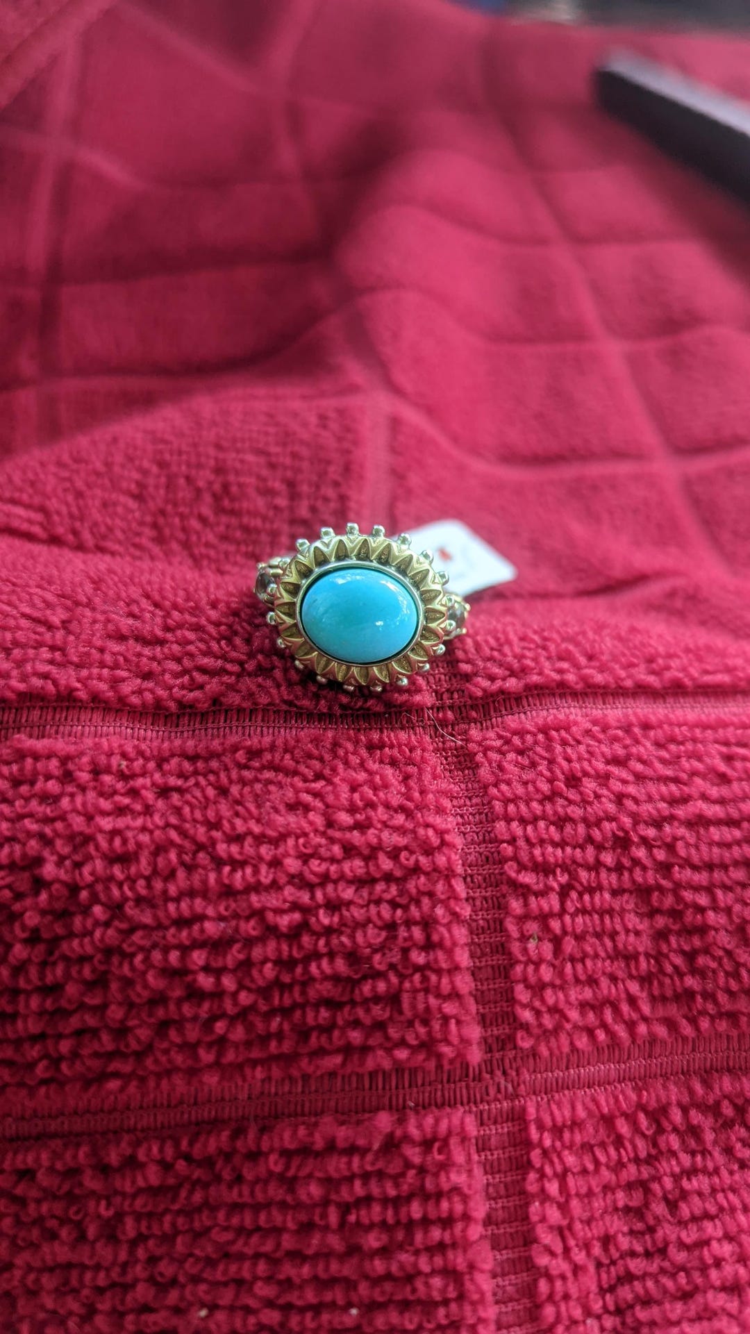 A Turquoise Stone Surrounds a Gold Design. Beautiful Art With Studs and ...