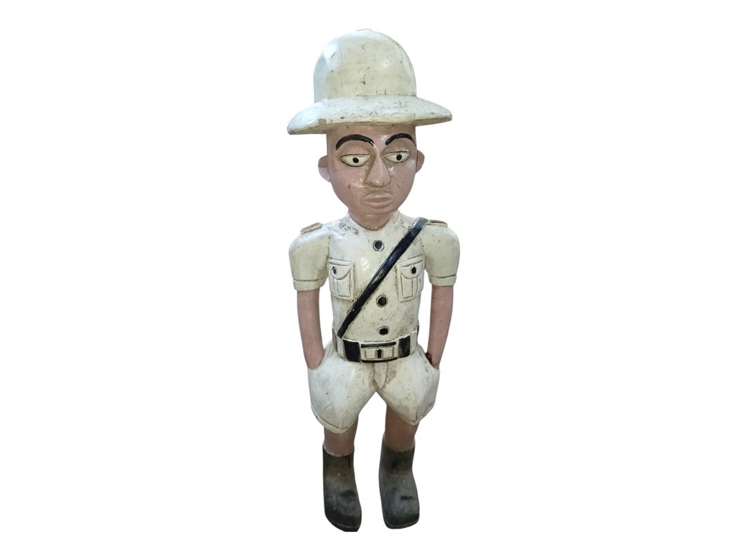 Hand-carved Wooden Police Officer Figurine: Colonial Era African Art - Etsy