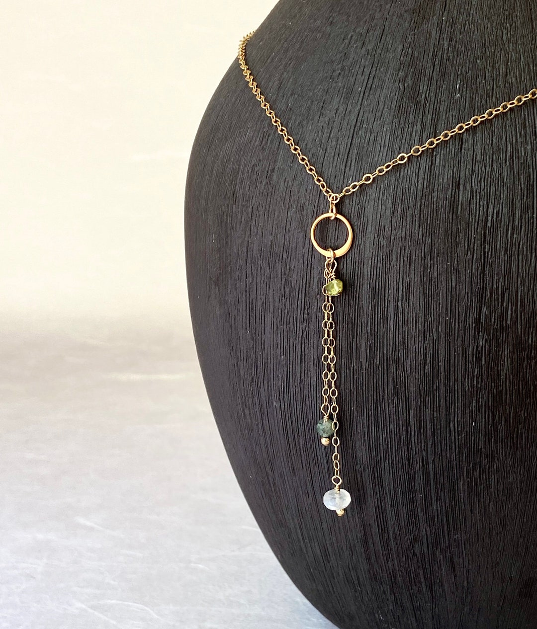 Faceted Fiery MOONSTONE, Blue/green KYANITE and PERIDOT Hang From ...