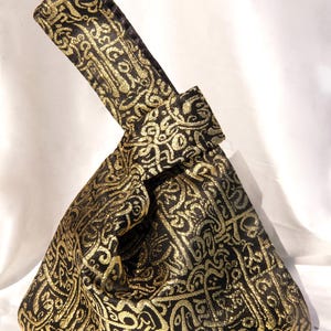 Hakaya Knot Bag | Black and Gold Arabic Calligraphy Purse | Cultural ...