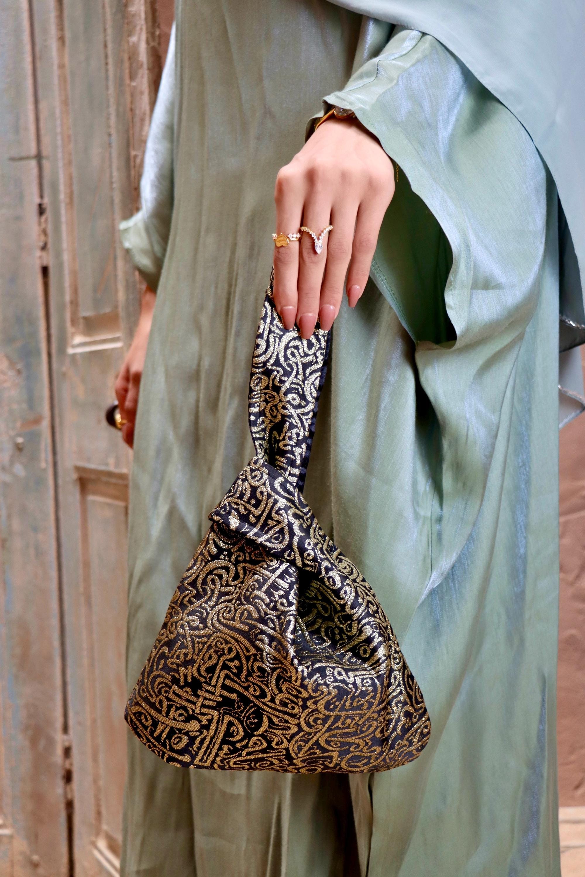 Hakaya Knot Bag | Black and Gold Arabic Calligraphy Purse | Cultural ...