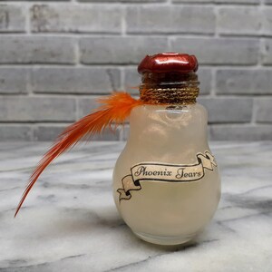 Phoenix Tears Magical Color Changing Potion Bottle Creatures and Beasts ...
