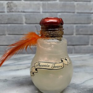 Phoenix Tears Magical Color Changing Potion Bottle Creatures and Beasts ...