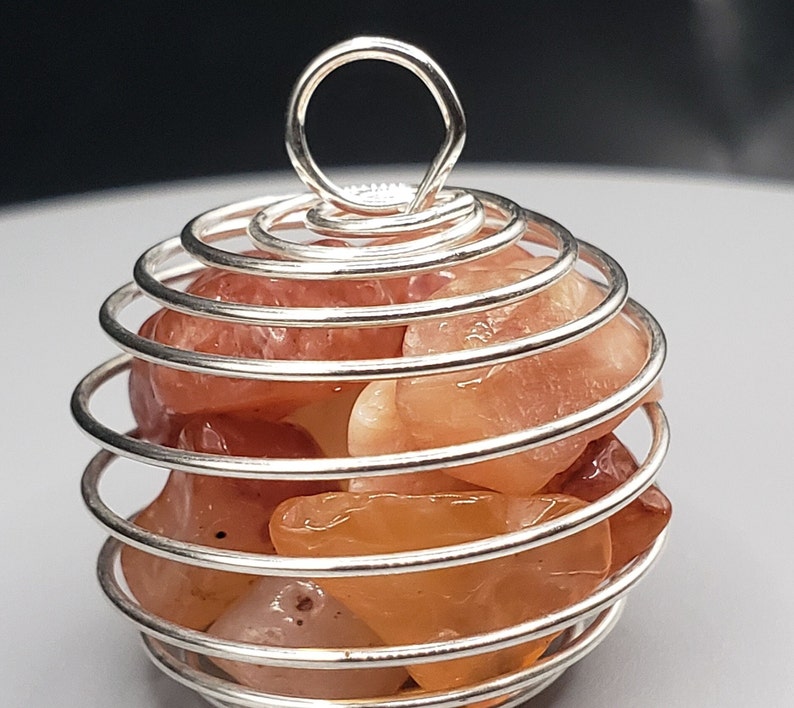 One (1) Carnelian Chip Spiral Cage Pendant With 18" Black Wax Cord ...