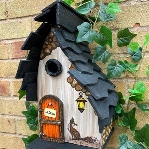 Whimsical Bird House Featuring a Fox, Owl, Lantern and Fairy Door. This ...
