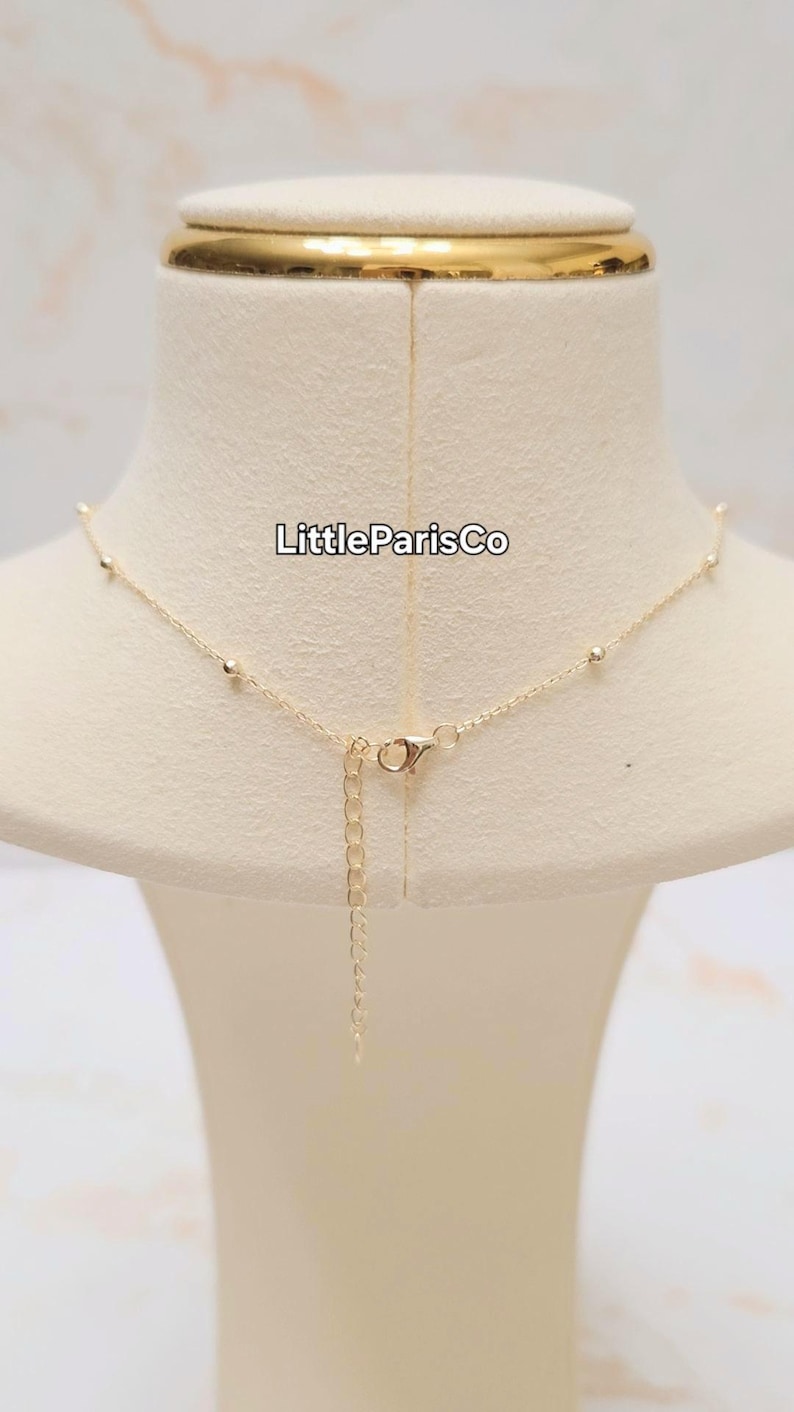 Petit collier en or avec pendentif croix en nacre : plaqué or 18 carats ...