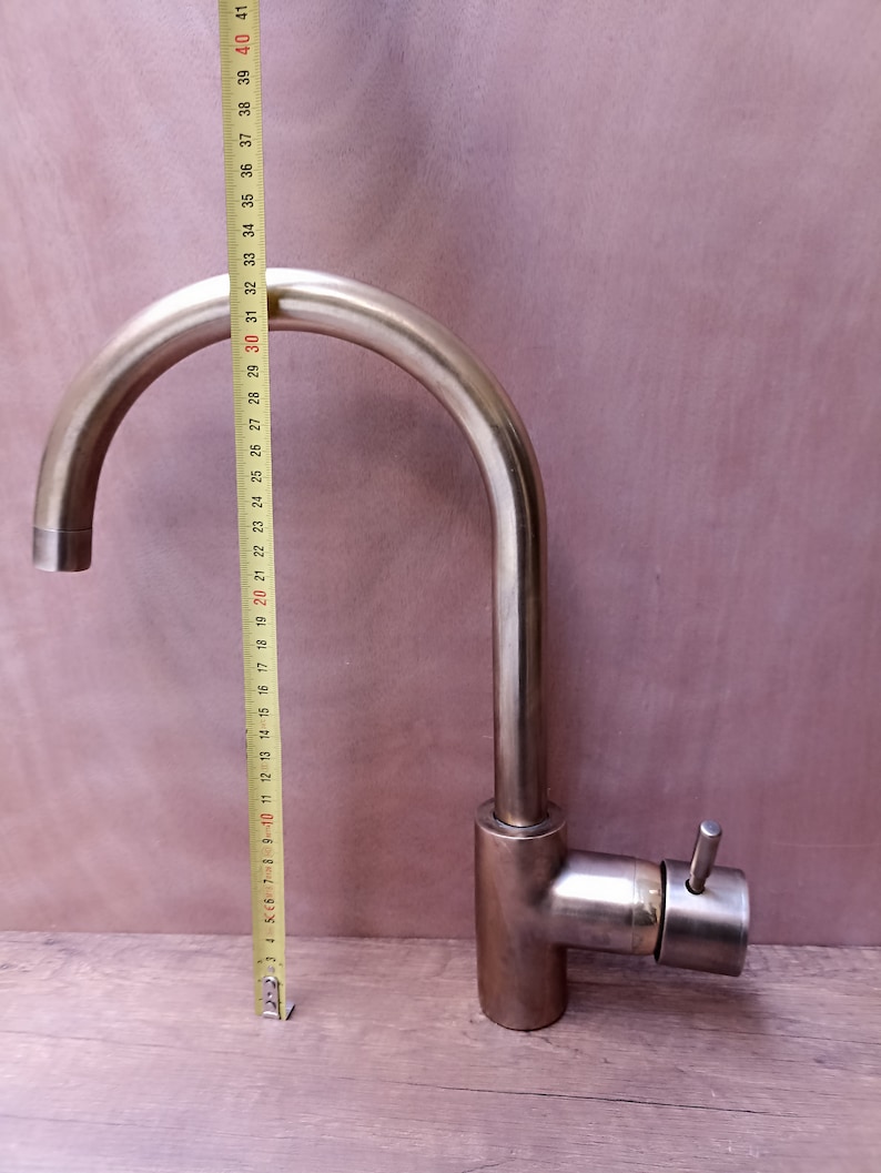 Exquisite Elegance: Unlacquered Brass Single Hole Basin Faucet and ...