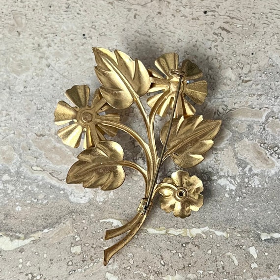 Vintage large gold flower brooch with chunky rhinesto… - Gem