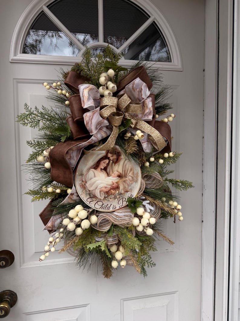 A Child is Born Winter Swag That is Very Natural Filled With Greens and ...