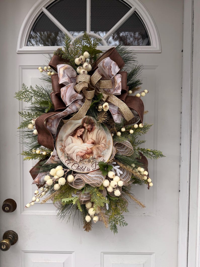 A Child is Born Winter Swag That is Very Natural Filled With Greens and ...