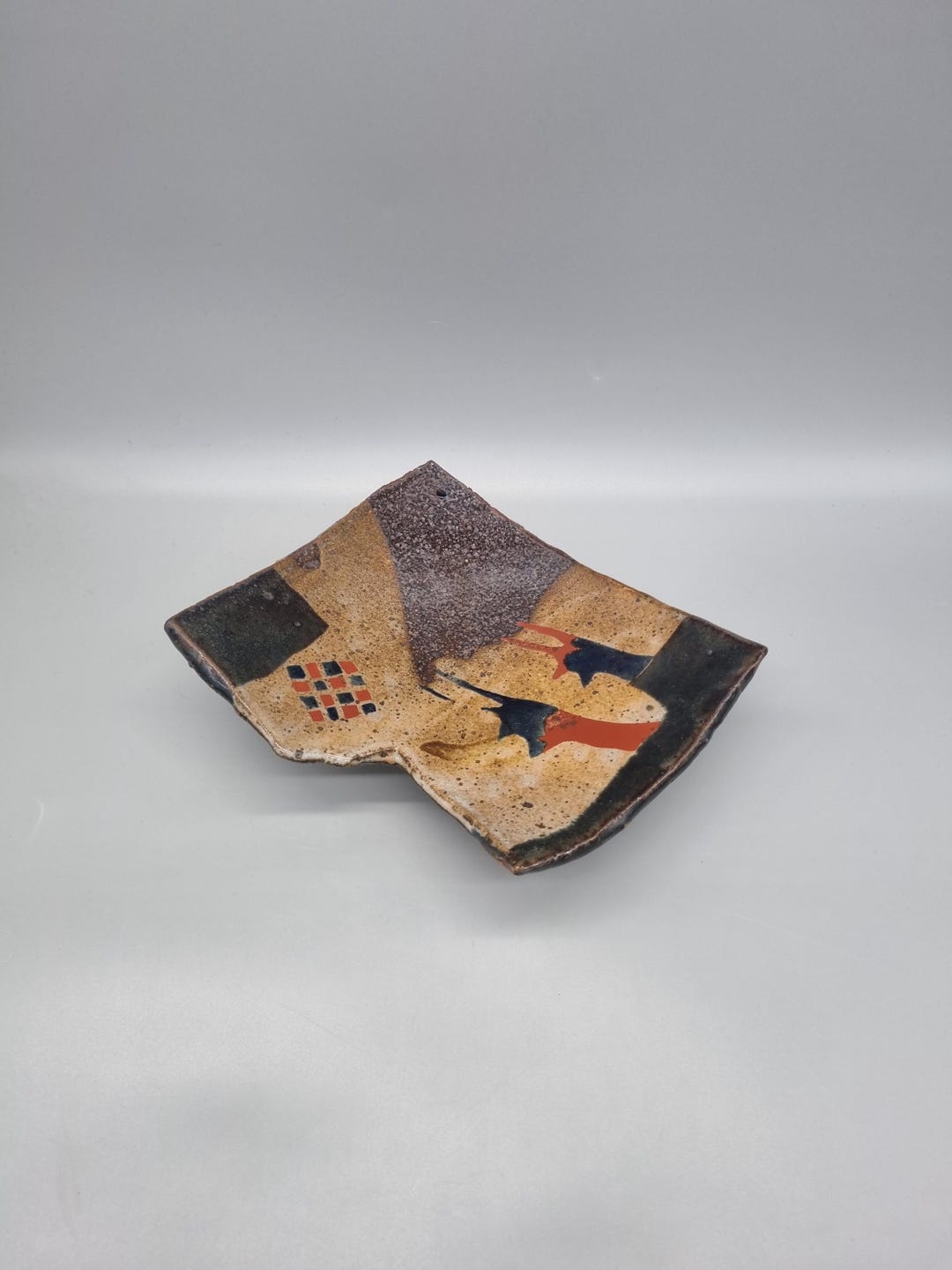 A John Maltby Studio Pottery Hand Decorated Footed Plate With Abstract ...