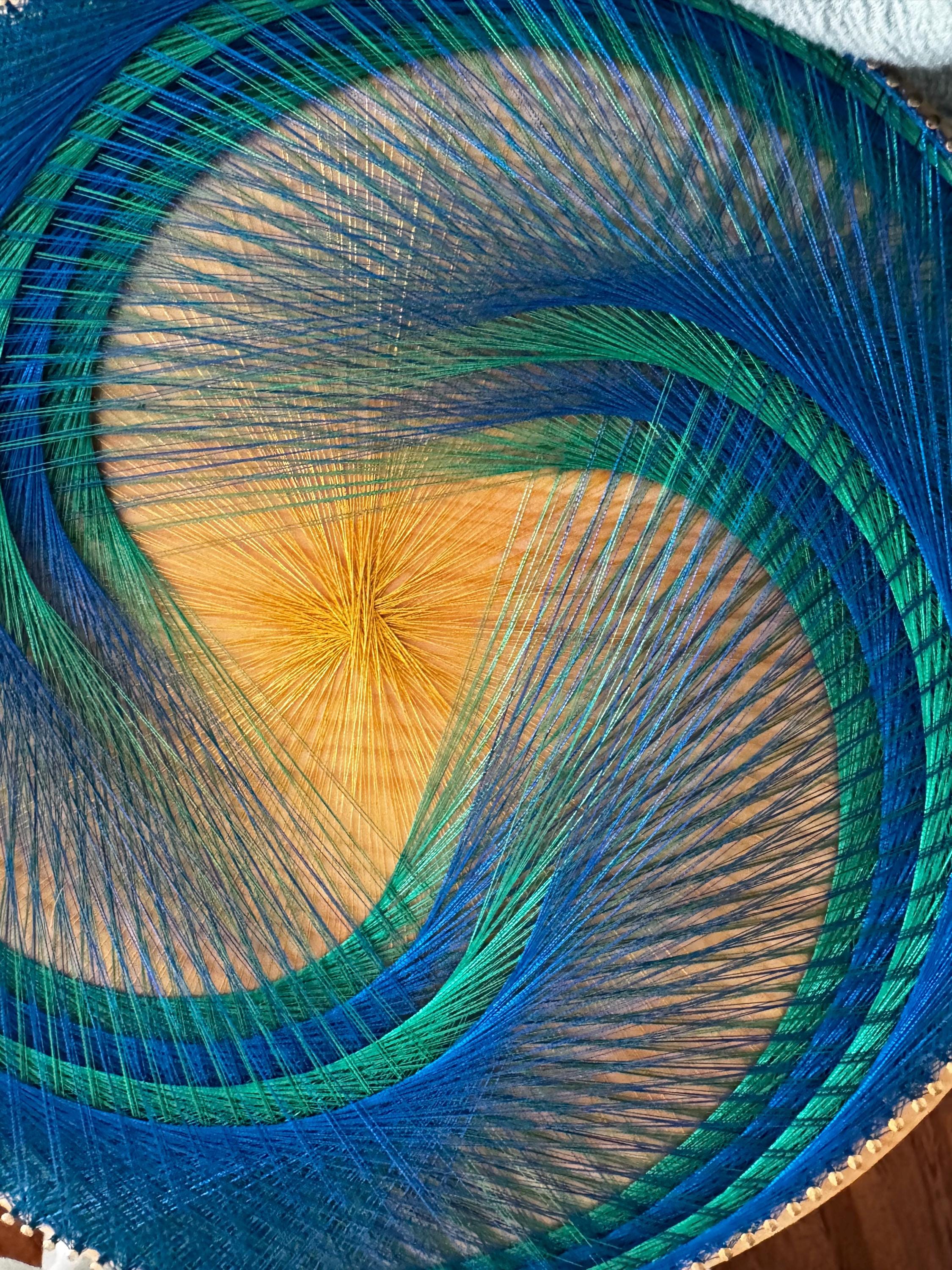 Geometric Spiral String Art: Blue, Green, and Yellow Fiber Wall Hanging ...