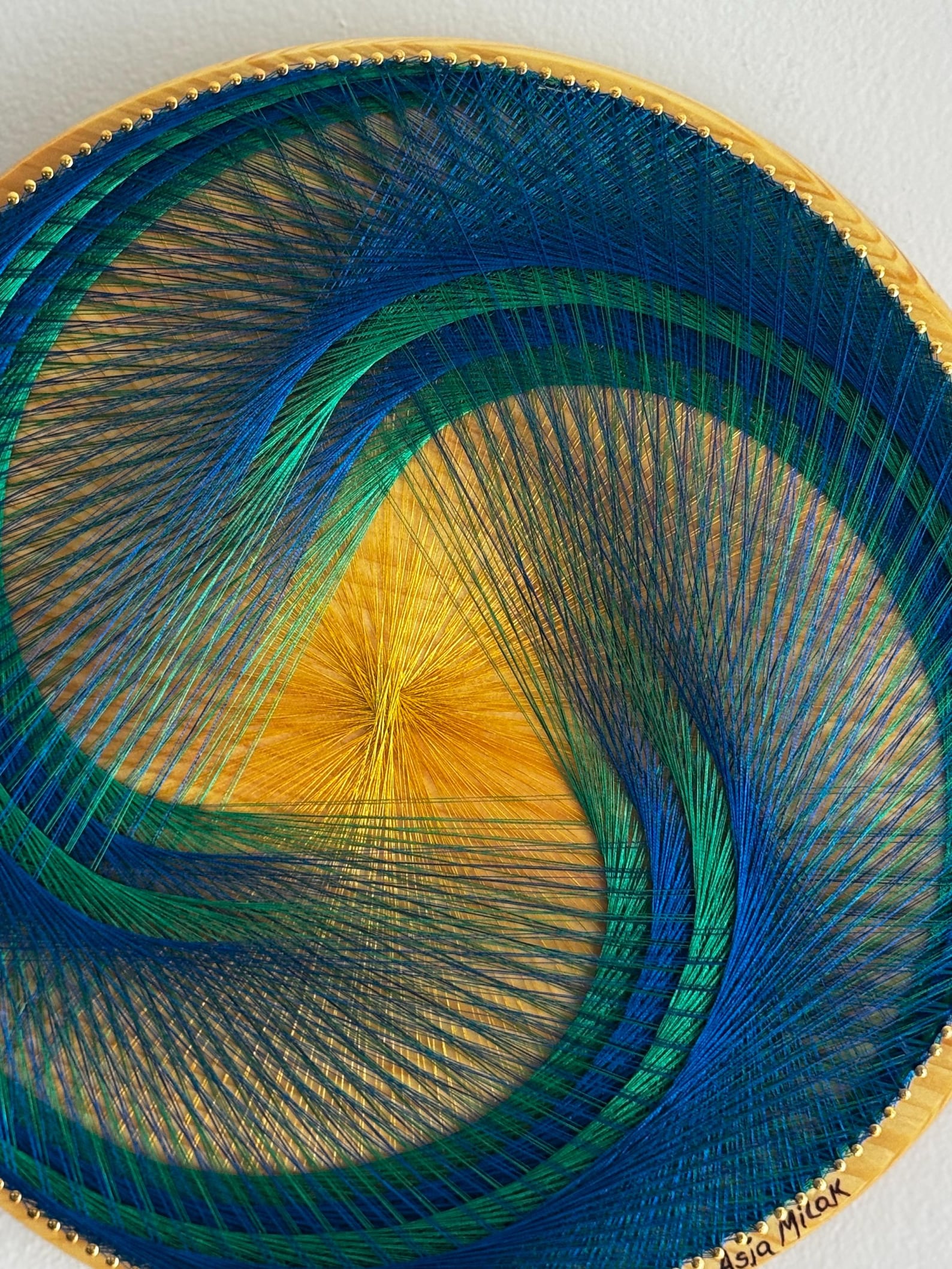 Geometric Spiral String Art: Blue, Green, and Yellow Fiber Wall Hanging ...