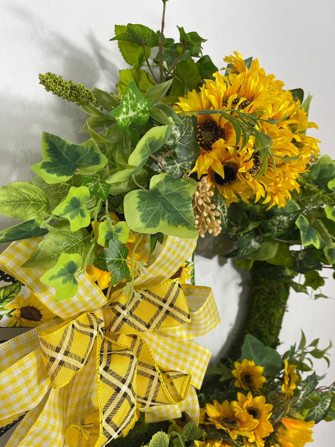 Beautiful Clusters of Sunflowers With Ivy and Berry Accents Will ...