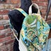 Full Size Denver Backpack With Fun Spring Colors and Beige Side Pockets ...