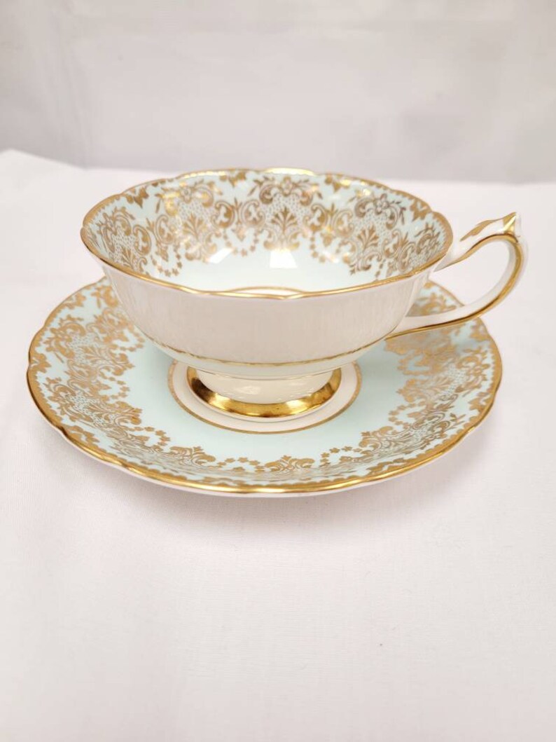 PARAGON Light Blue Floating Roses Teacup and Saucer Set RARE - Etsy