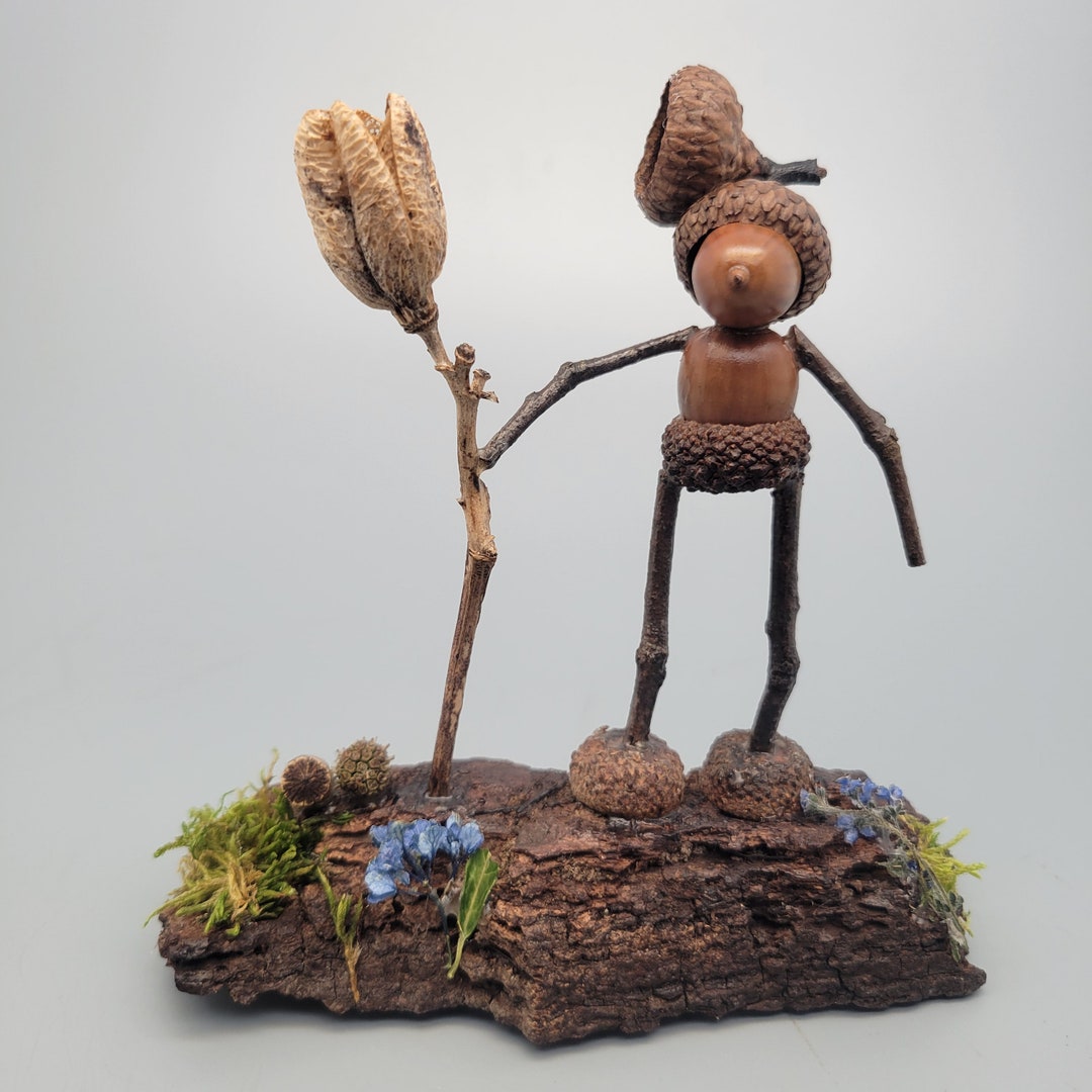 Oakie Acorn Elf Holding a Walking Stick While He's Looking Around at ...