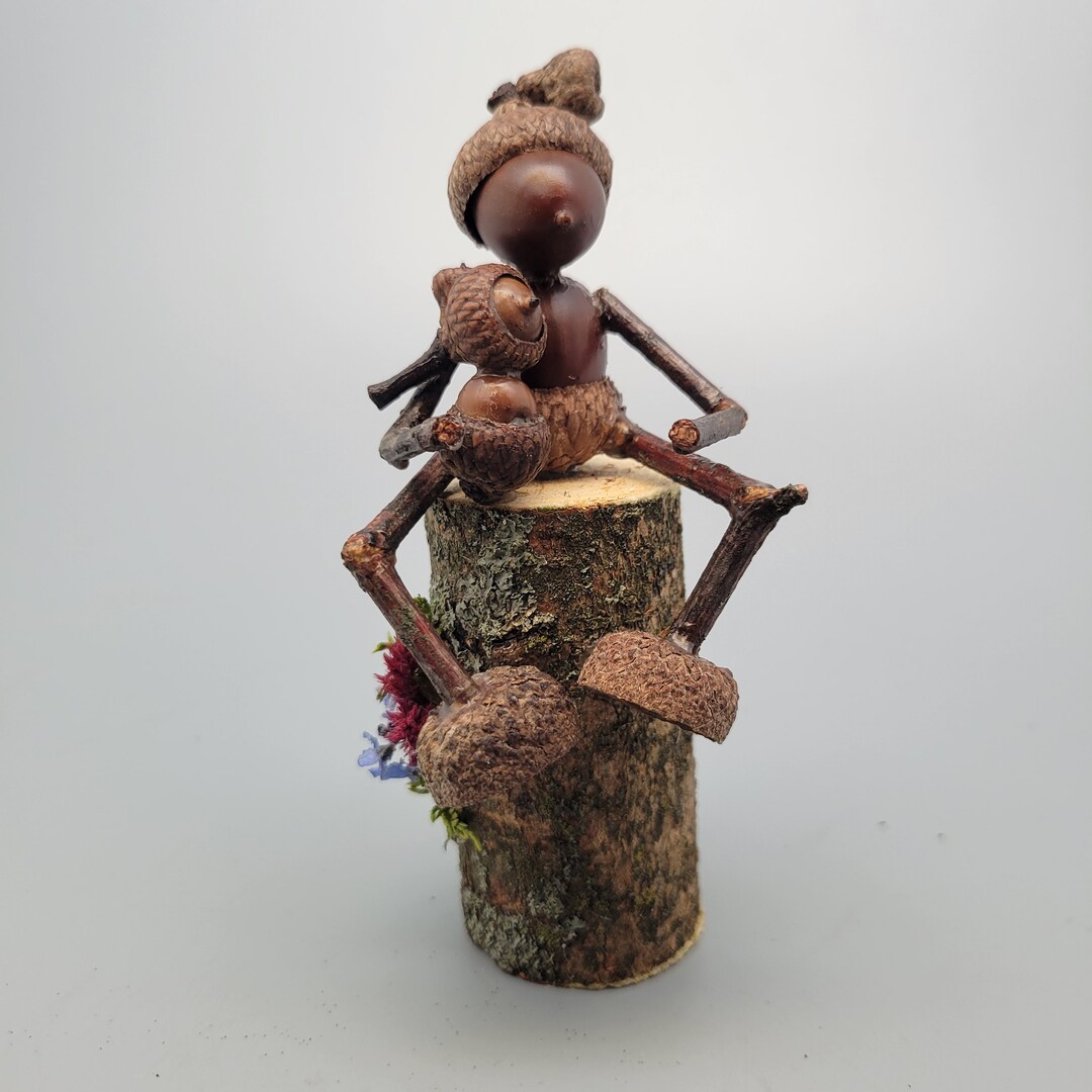 Oakie Acorn Elf Dad, Sitting on a Tree Stump With a Child on His Lap ...