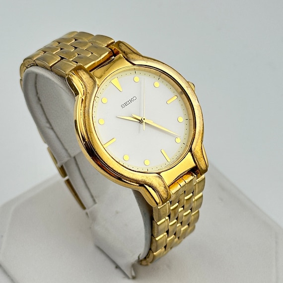 Vintage Seiko Gold Tone Day Date Midsized 35mm quartz… - Gem