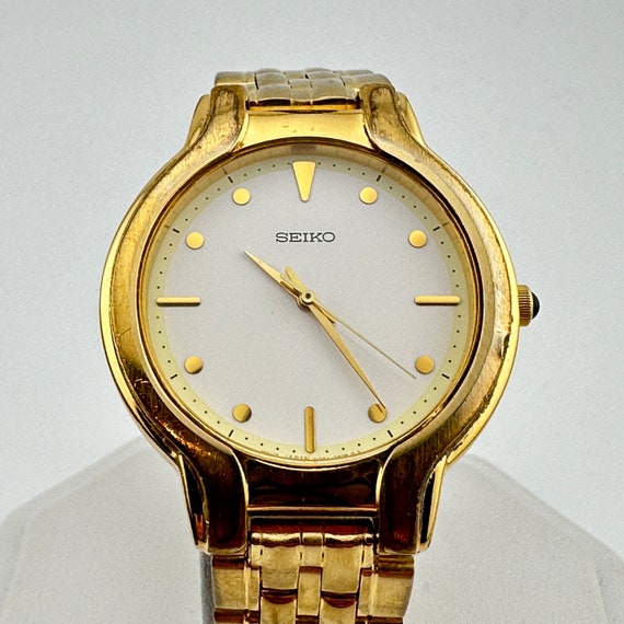 Vintage Seiko Gold Tone Day Date Midsized 35mm quartz… - Gem