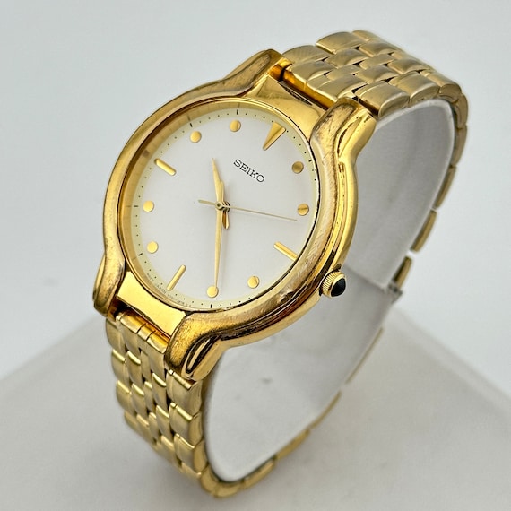Vintage Seiko Gold Tone Day Date Midsized 35mm quartz… - Gem