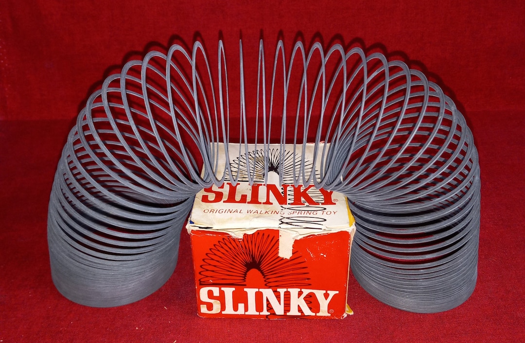 Vintage "slinky" Original Walking Spring Toy W/ Box JAMES Industries. # ...