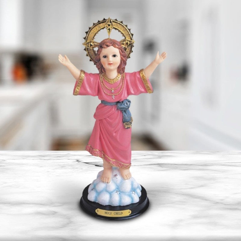 Santos Statue - Etsy