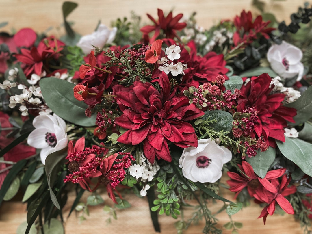 White Anemone and Burgundy Winter Eucalyptus Wedding Arch Arrangement ...