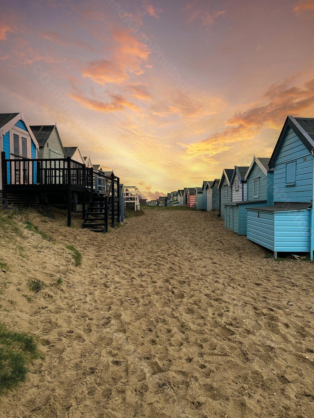 Colourful Beach Huts at Sunset, Mersea Island, Colchester, Essex. 2025 ...