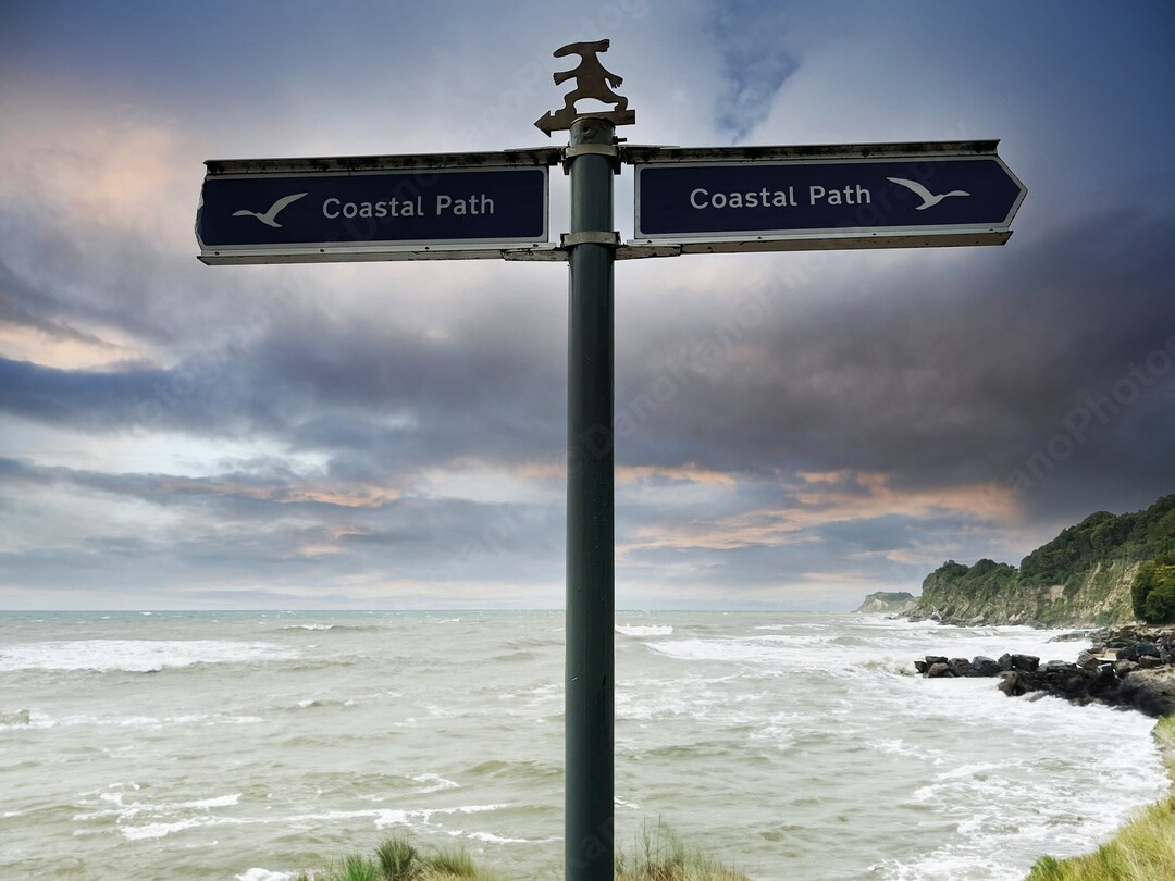 Coastal Path Sign With Crashing Waves Against the Shore, Isle of Wight ...