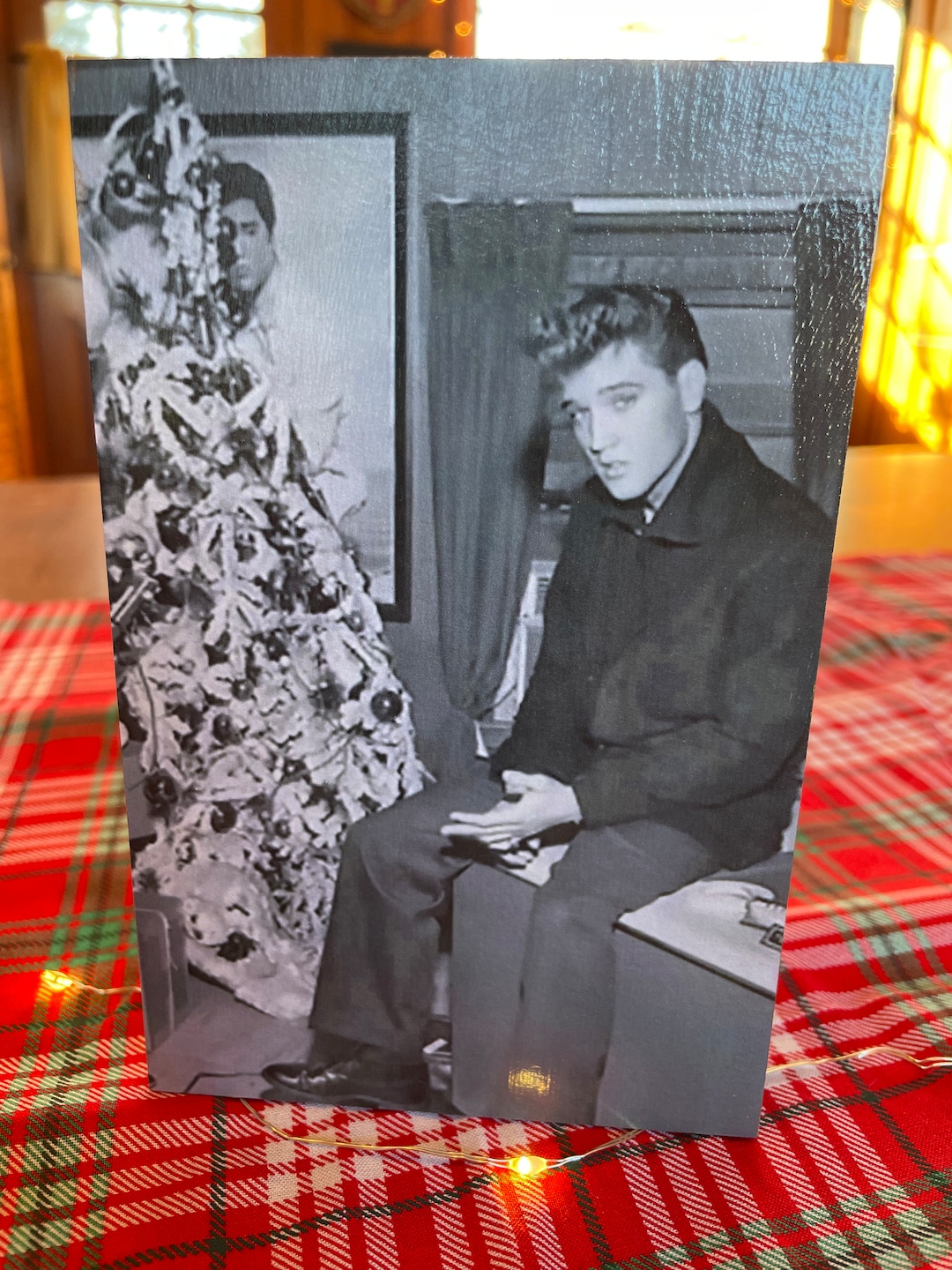 Great Image of Elvis Presley Sitting on A Desk Next to A Christmas Tree ...