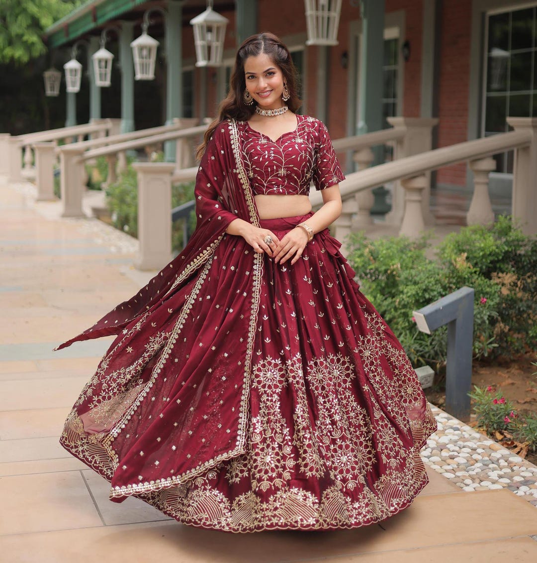 Ethereal Maroon Lehenga Adorned With Exquisite Embroidery and Timeless ...