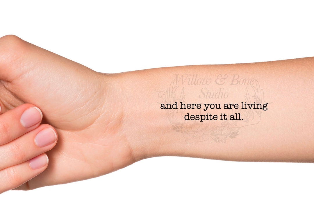 And Here You Are Living Despite It All. Typewriter Quote Temporary ...