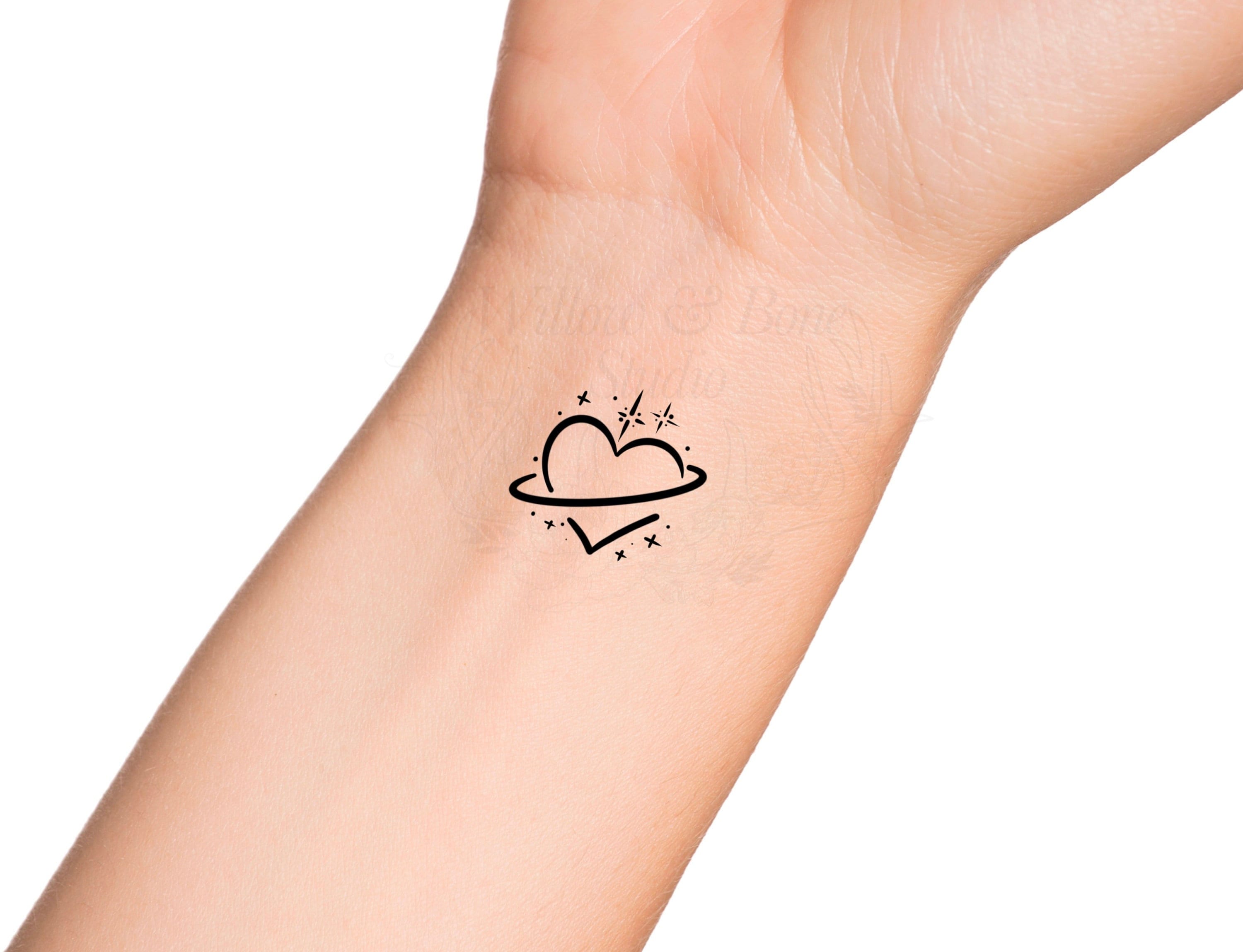 Saturn Symbol Tattoo